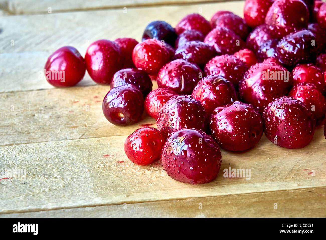 Group of Fresh Ripe Red Sweet Cherries on Wooden Background Stock Photo ...