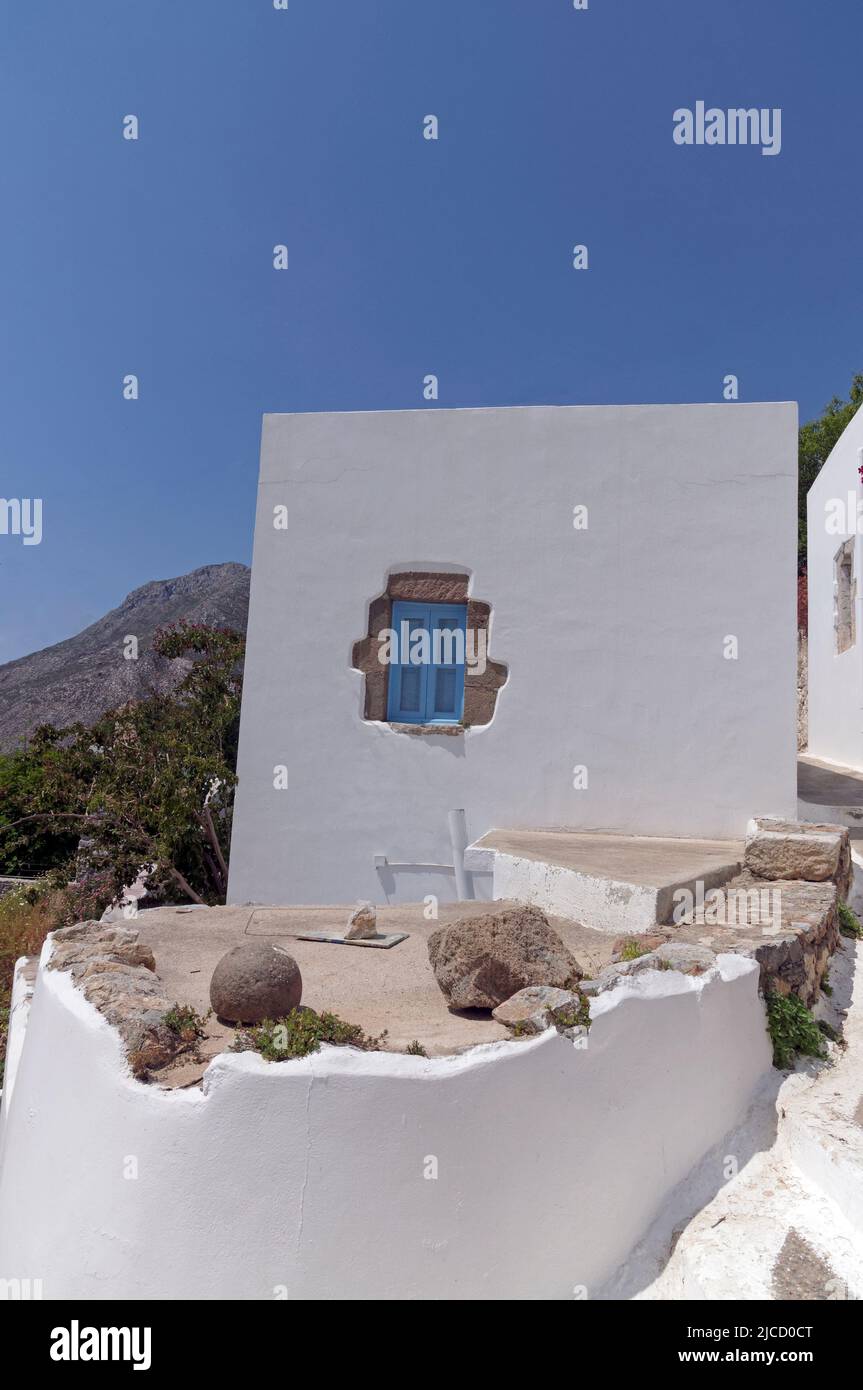Whitewashed house with attractive stonework. Megalo Chorio mountain ...