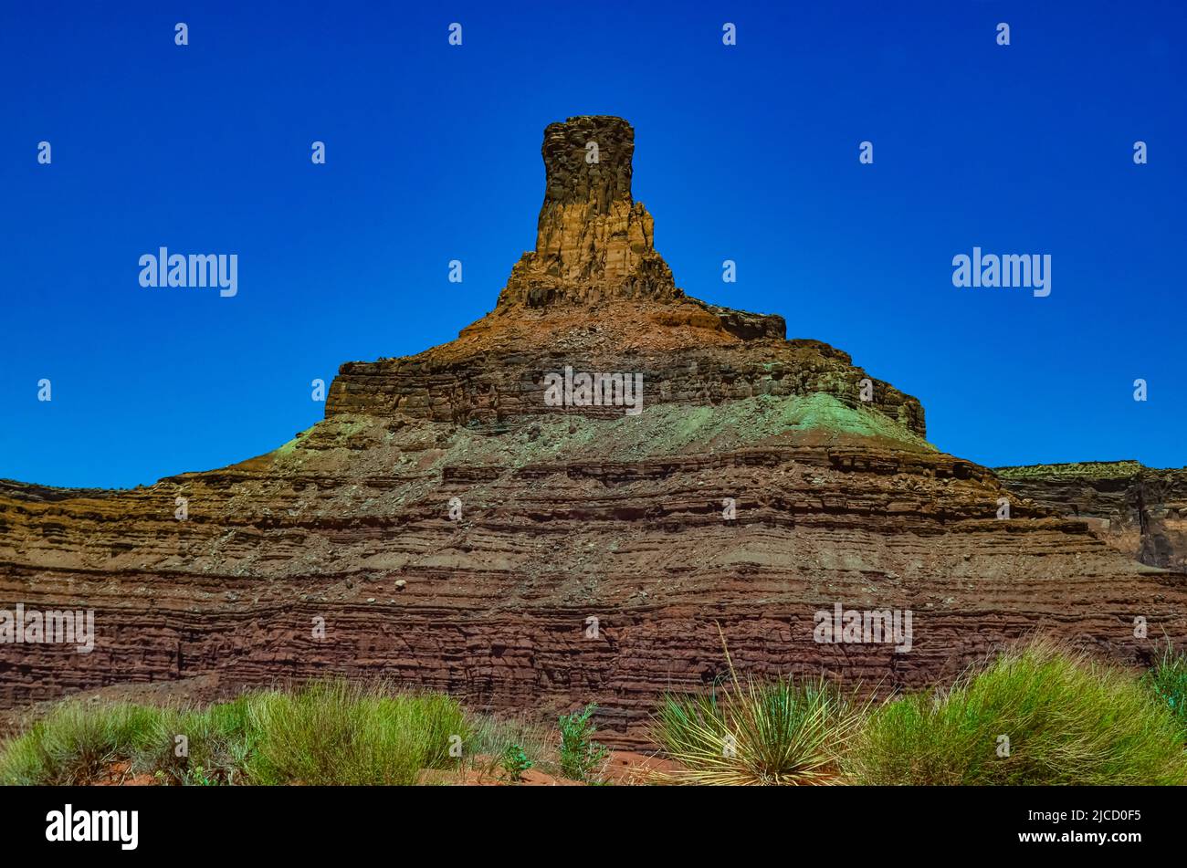 Layered geological formations of red rocks in Canyonlands National Park ...