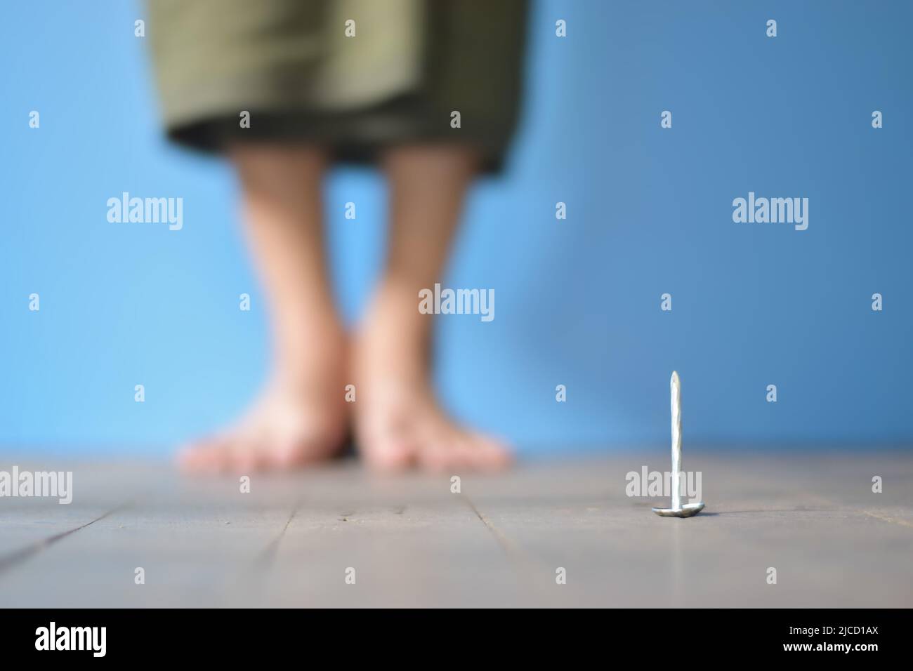 Concept of risk of nail injury and tetanus infection Stock Photo - Alamy