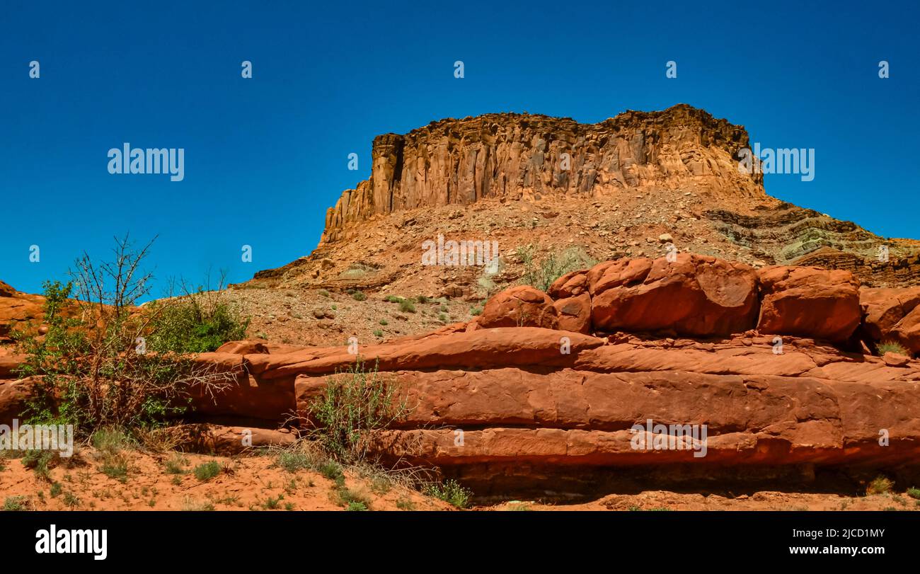 Layered geological formations of red rocks in Canyonlands National Park ...