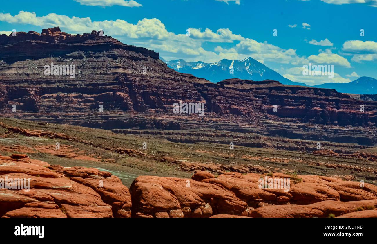 Layered geological formations of red rocks in Canyonlands National Park ...