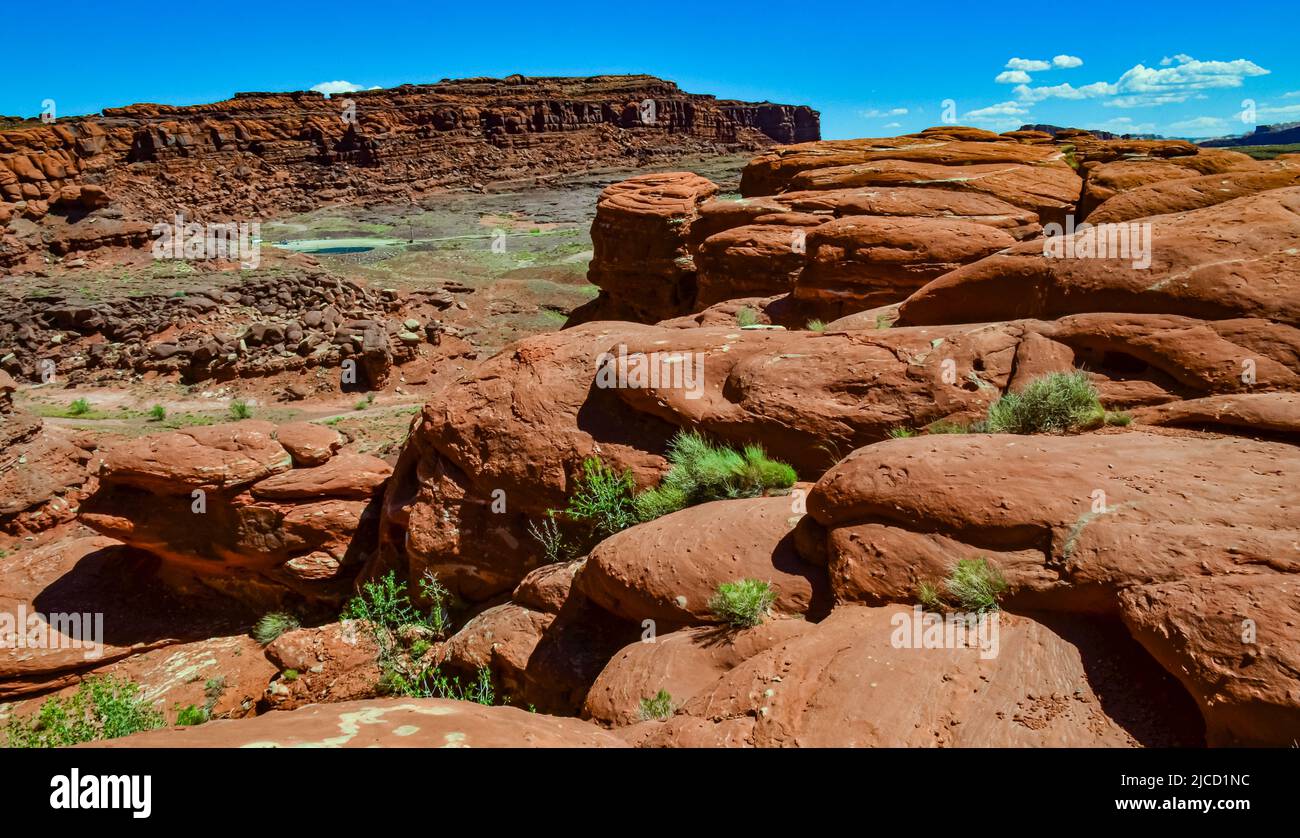 Layered geological formations of red rocks in Canyonlands National Park ...