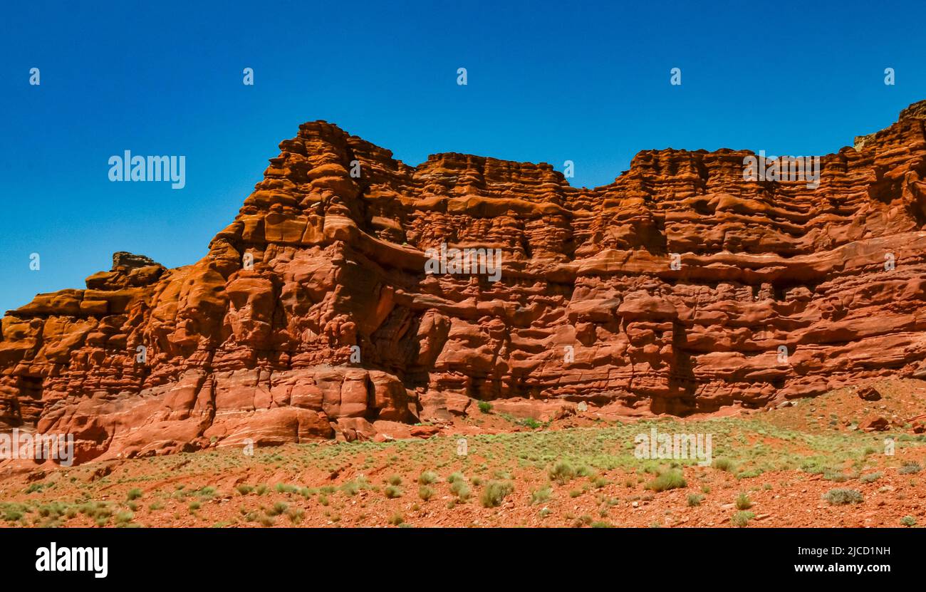 Layered geological formations of red rocks in Canyonlands National Park ...