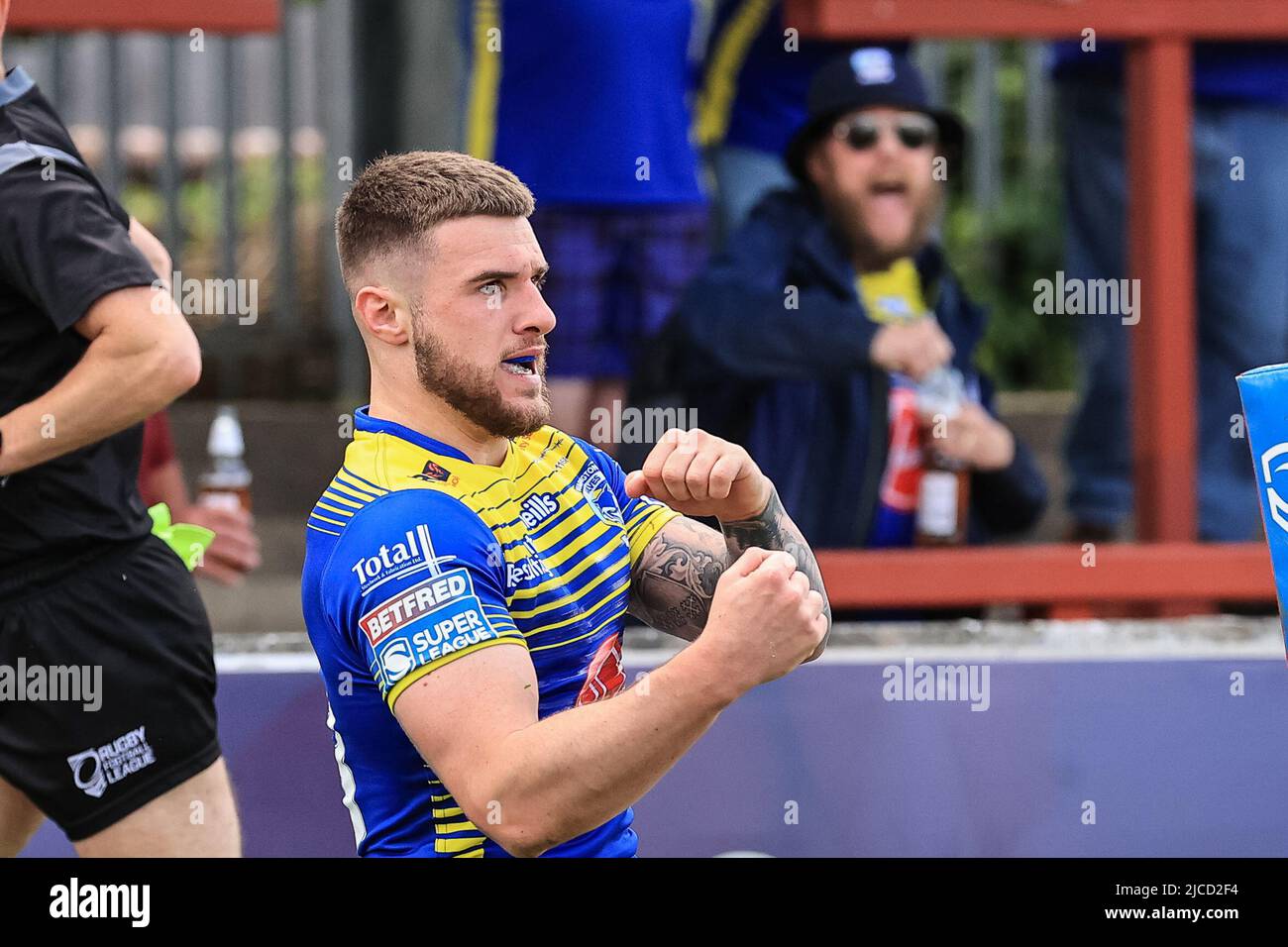 Connor Wrench #23 of Warrington Wolves celebrates his try Stock Photo ...