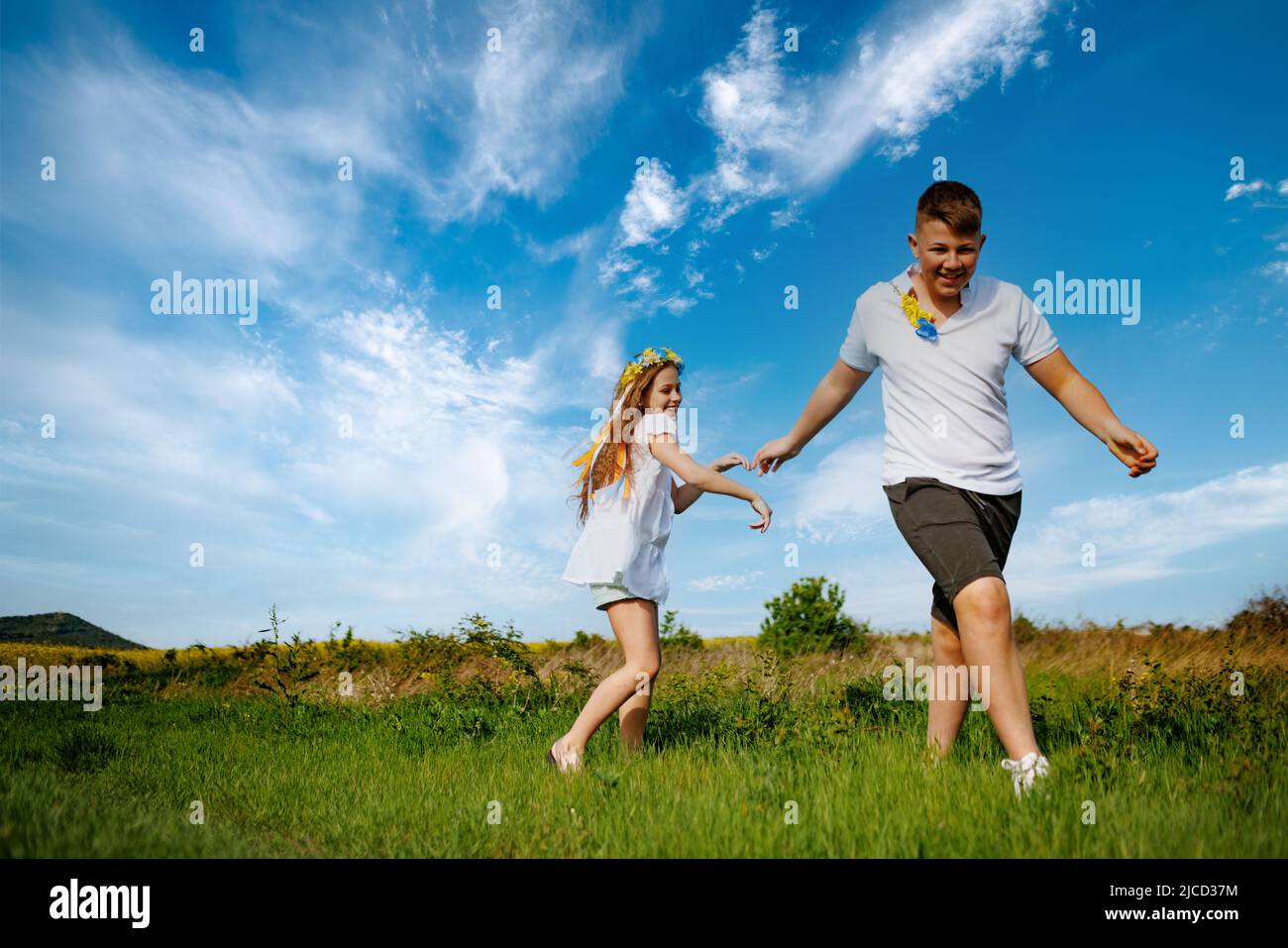 Cheerful energetic family teenagers: older big brother and younger ...