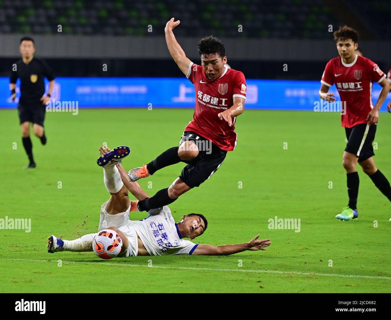 Meizhou, China's Guangdong Province. 12th June, 2022. Kim Minwoo (top C ...