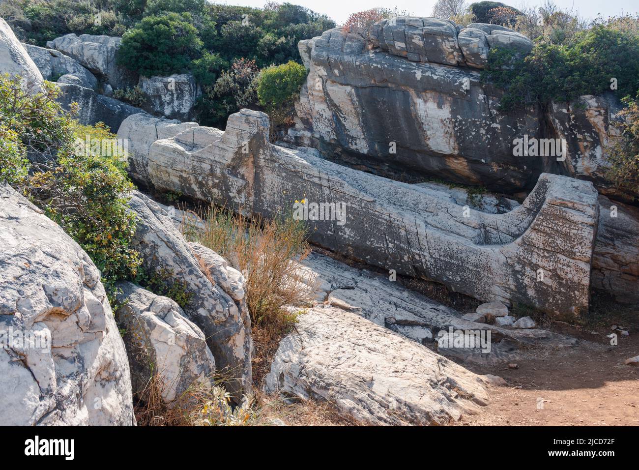 The unfinished marble Kouros of Apollonas (also called the Colossus of ...