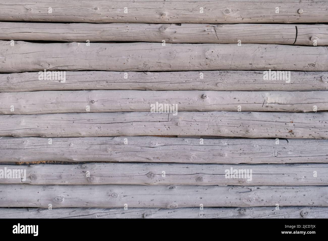White painted wooden logs wall background Stock Photo - Alamy