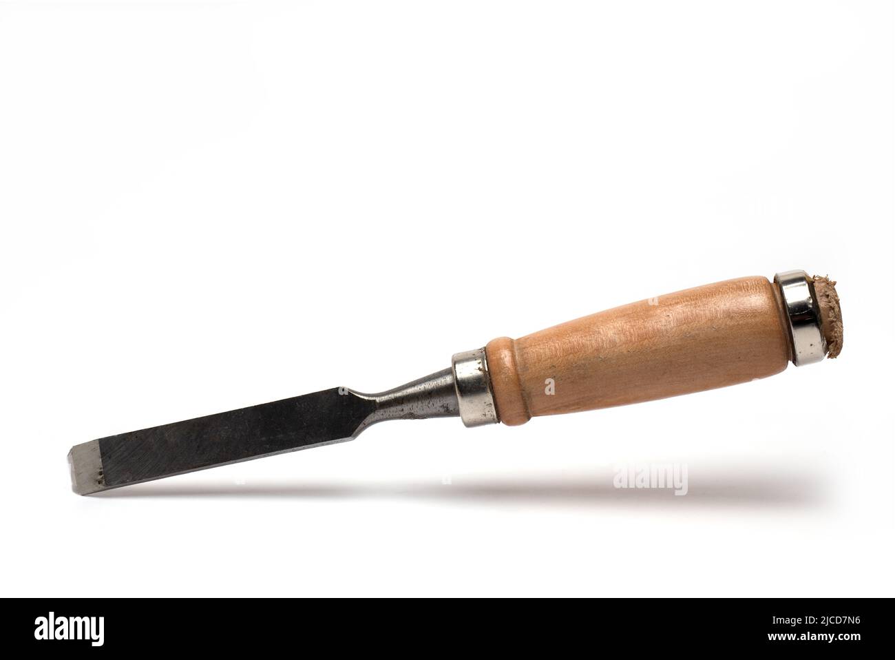 Close up of sharp chisel from carpenter workshop with wooden Handle on ...