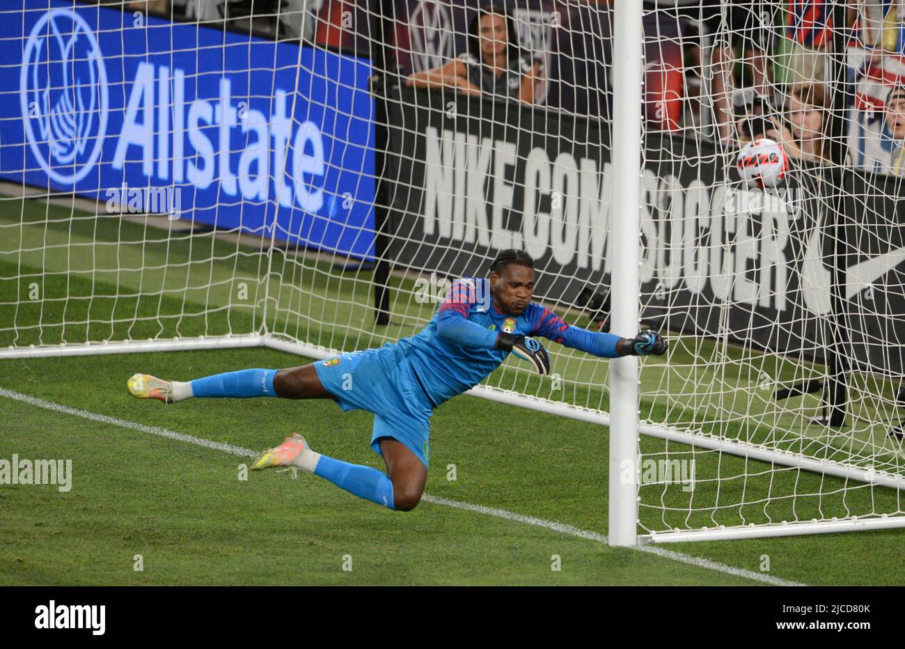 AUSTIN, TX - JUNE 10: Grenada goalkeeper Jason Belfon is too late on a ...