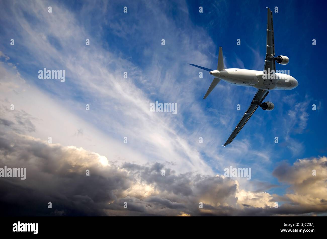 Plane is escaping from bad weather Stock Photo - Alamy