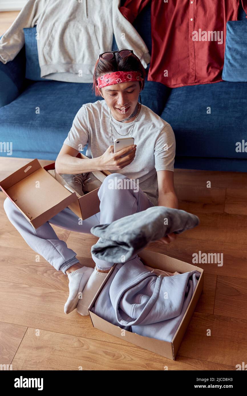 Asian guy making video hi-res stock photography and images - Alamy