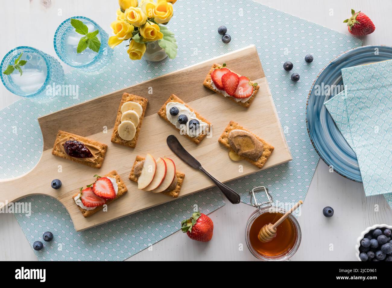 Breakfast crackers topped with fresh fruit, nut butter or cream cheese ...