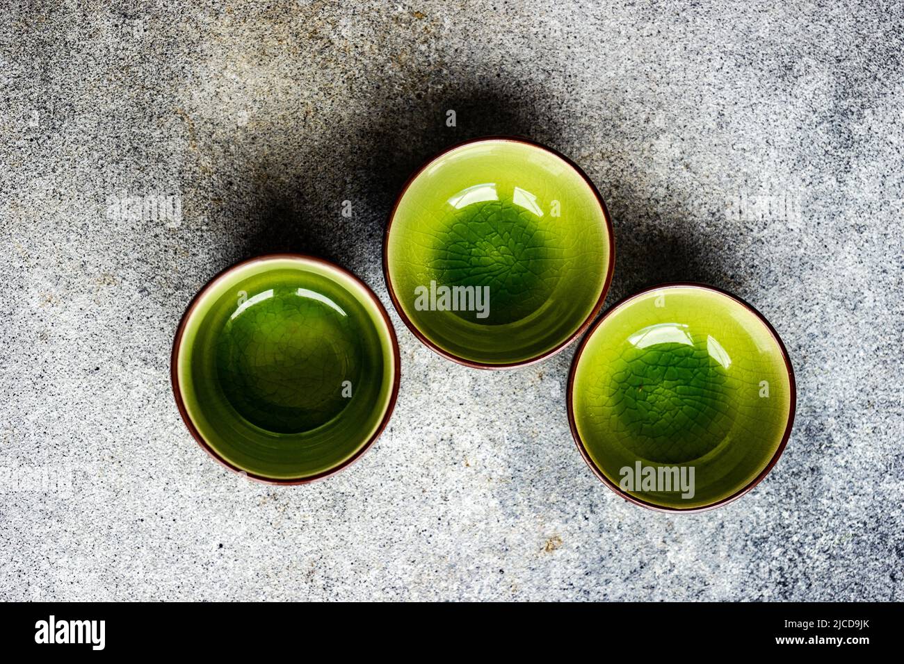 Round geometric green ceramic shapes on concrete background Stock Photo ...