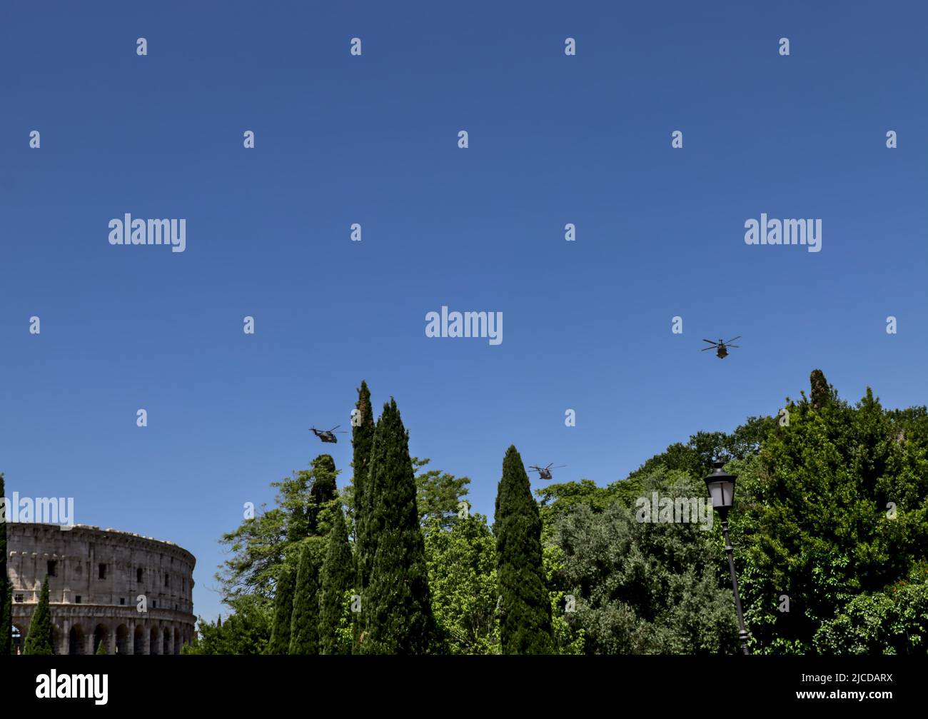 Italian military parade on 2 June. Group of helicopters flies over the ...