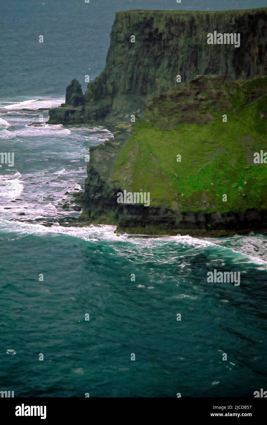 Waves lapping precipitous cliffs of moher hi-res stock photography and ...