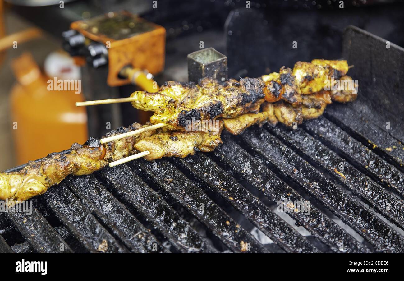 Detail of grilled meat, greasy food Stock Photo - Alamy