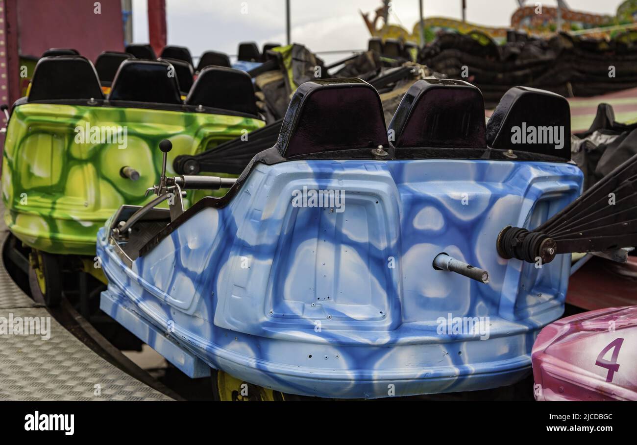 Empty amusement ride seats hi-res stock photography and images - Alamy