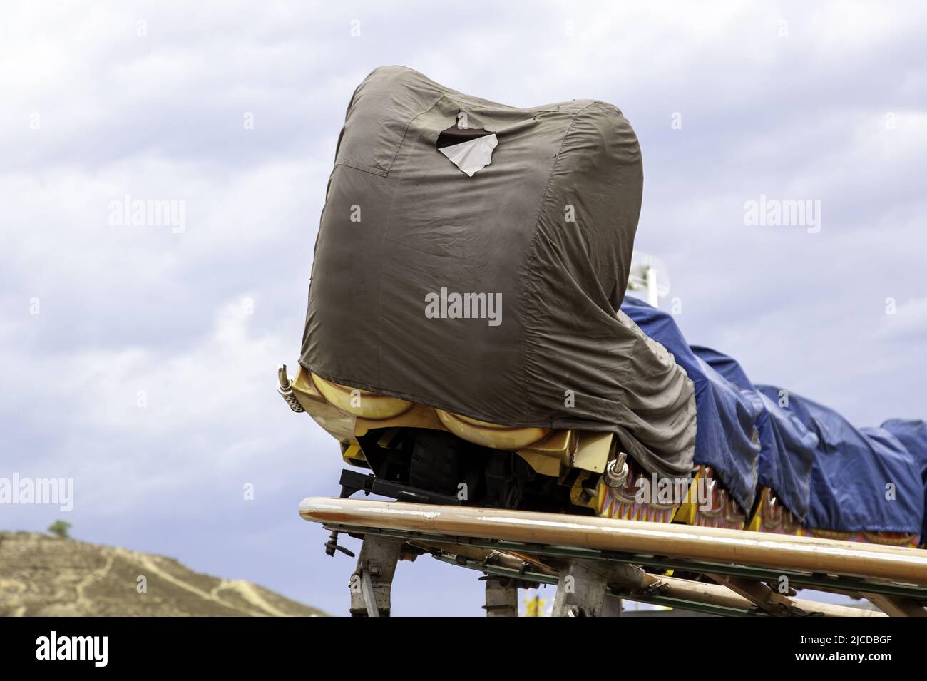 Detail of seats of a fair, fun and party attraction Stock Photo - Alamy