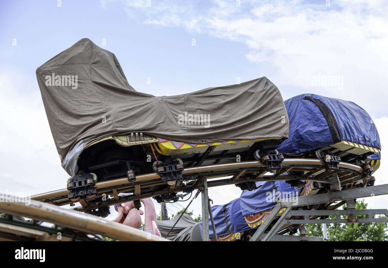 Detail of seats of a fair, fun and party attraction Stock Photo - Alamy