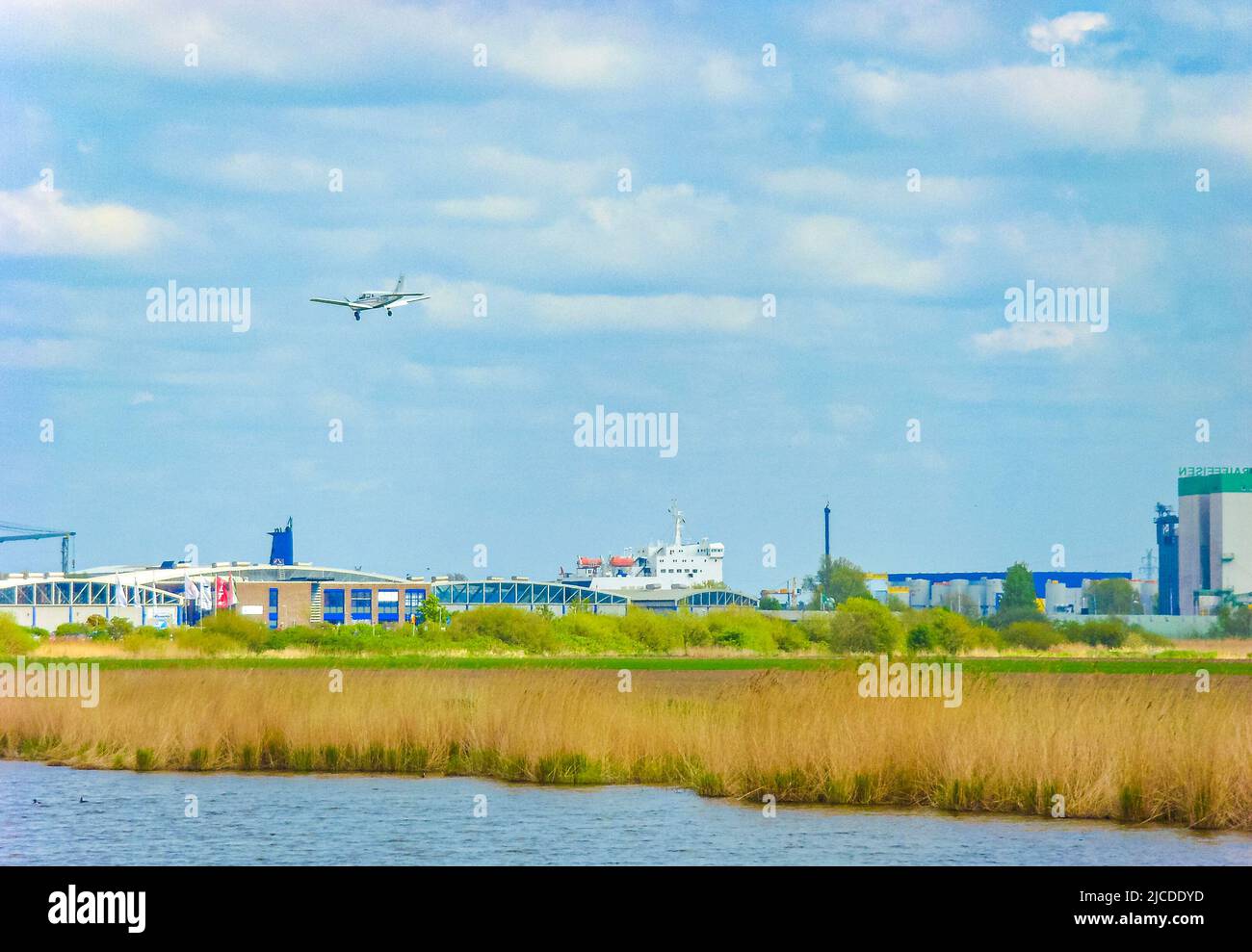 Plane airplane flies above cityscape and coast panorama of ATLANTIC ...