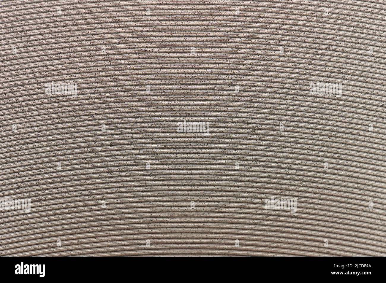 Round metal lines on grainy surface macro close up view Stock Photo - Alamy
