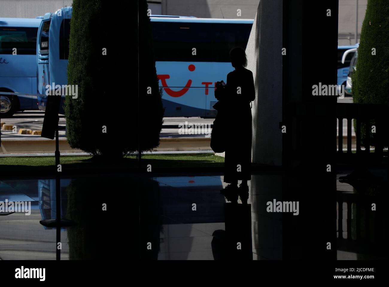 Standing next to a bus hi-res stock photography and images - Alamy