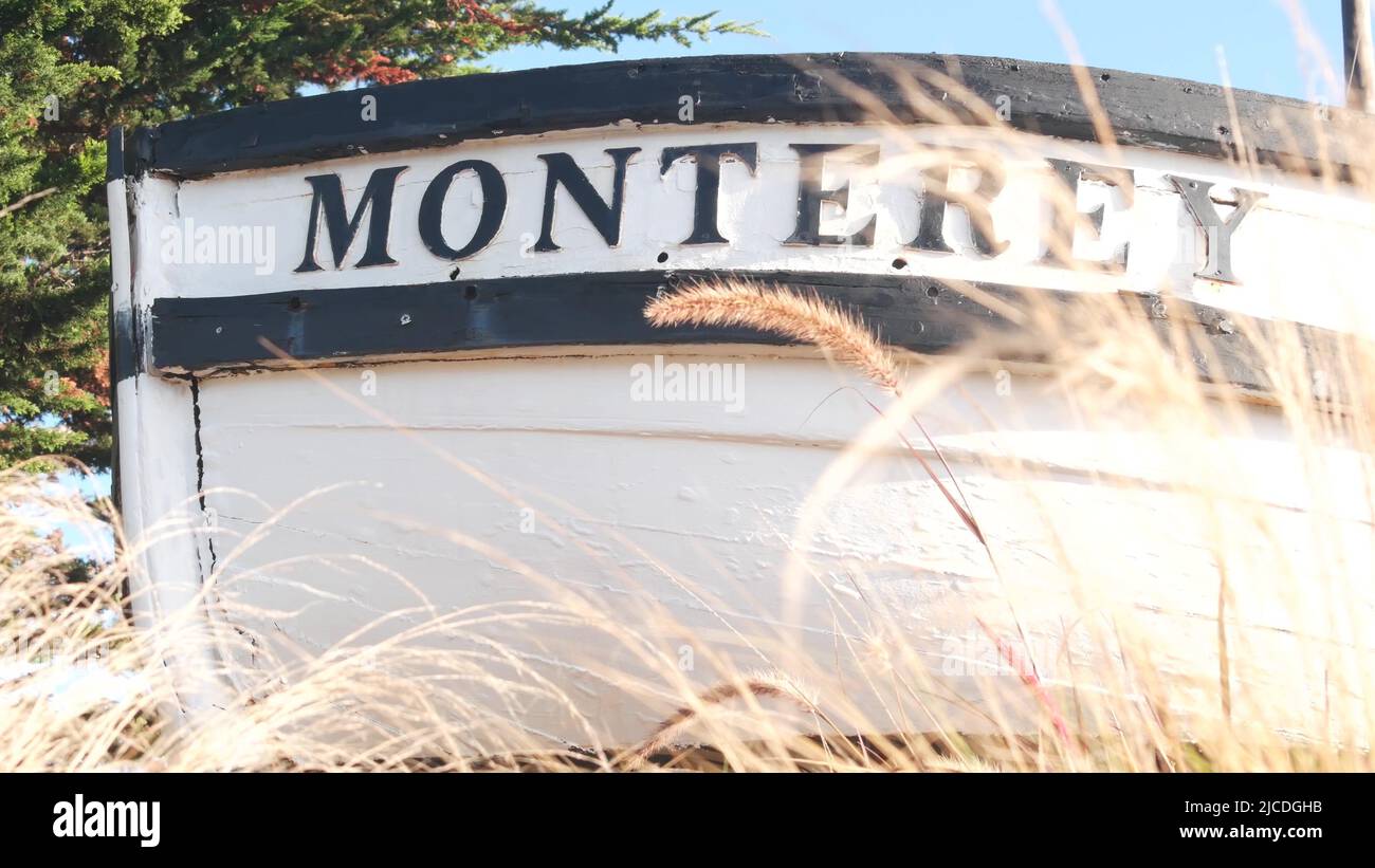 Monterey sign on white wooden boat stern, fisherman nautical vessel ...