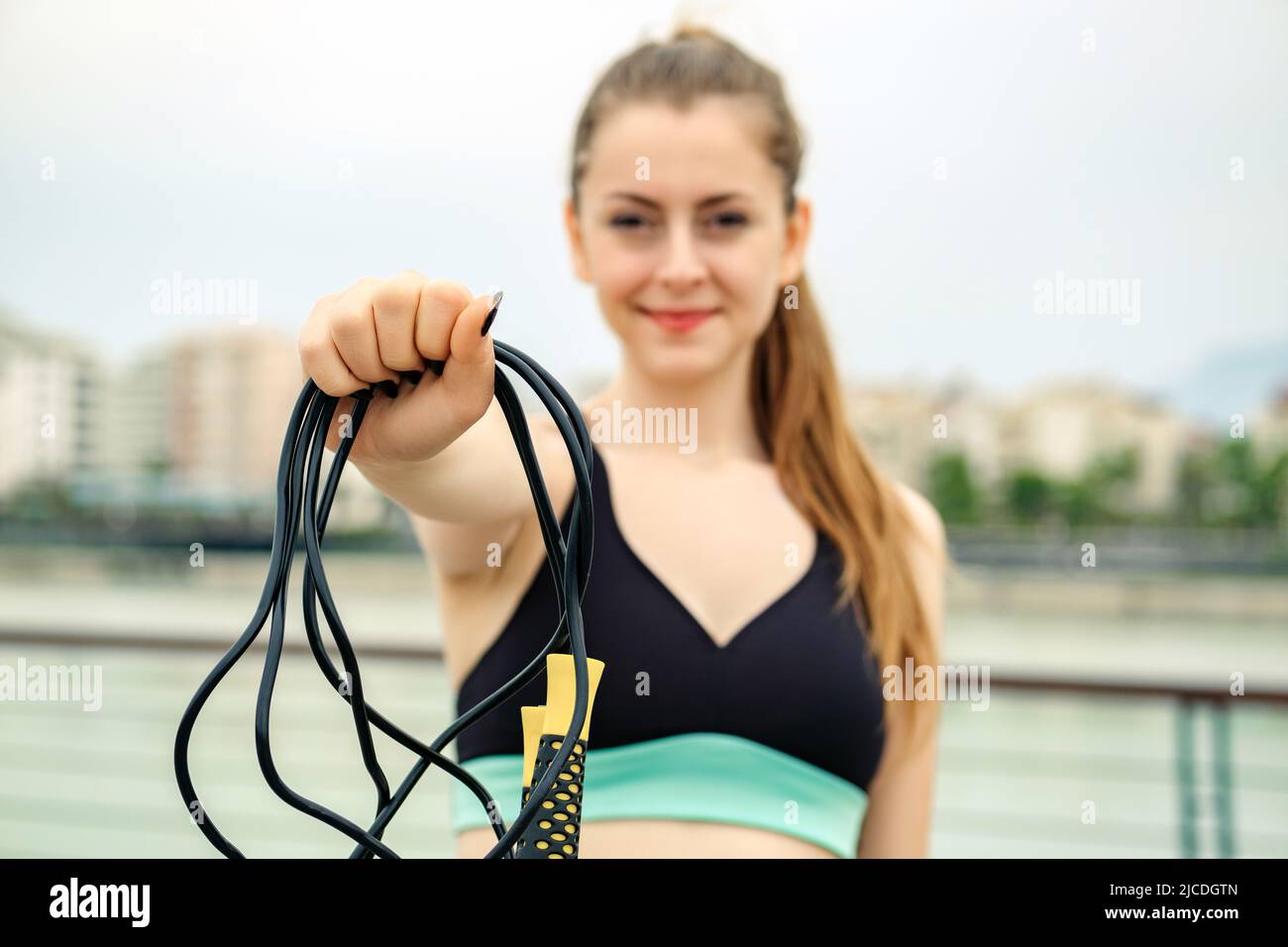 Cute Caucasian Woman Wearing Sportive Clothes On City Park Outdoors