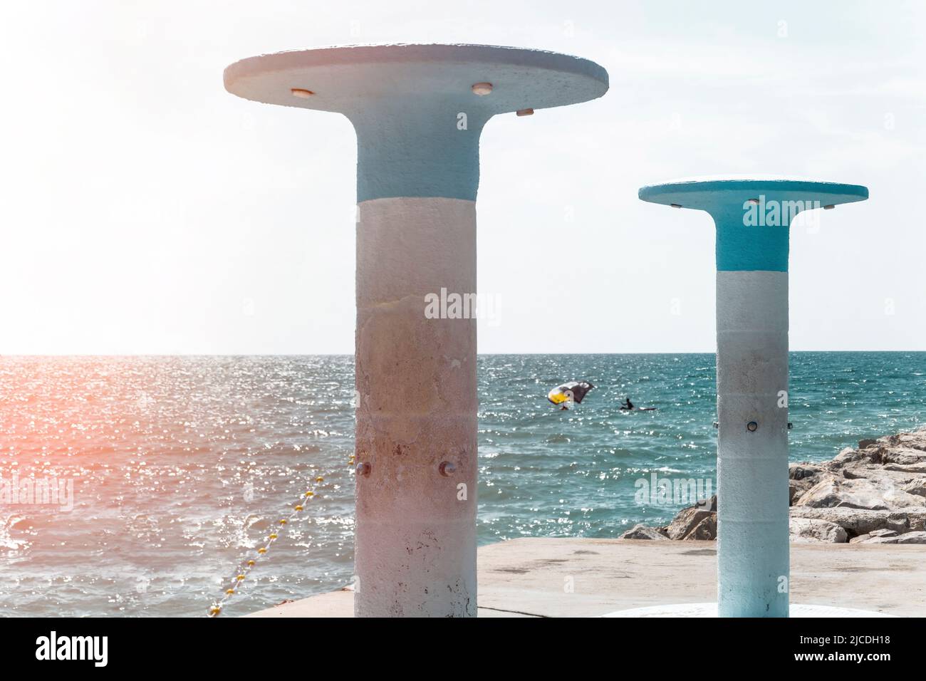 Stone columns with public showers in Sitges Beach, Barcelona, Spain ...