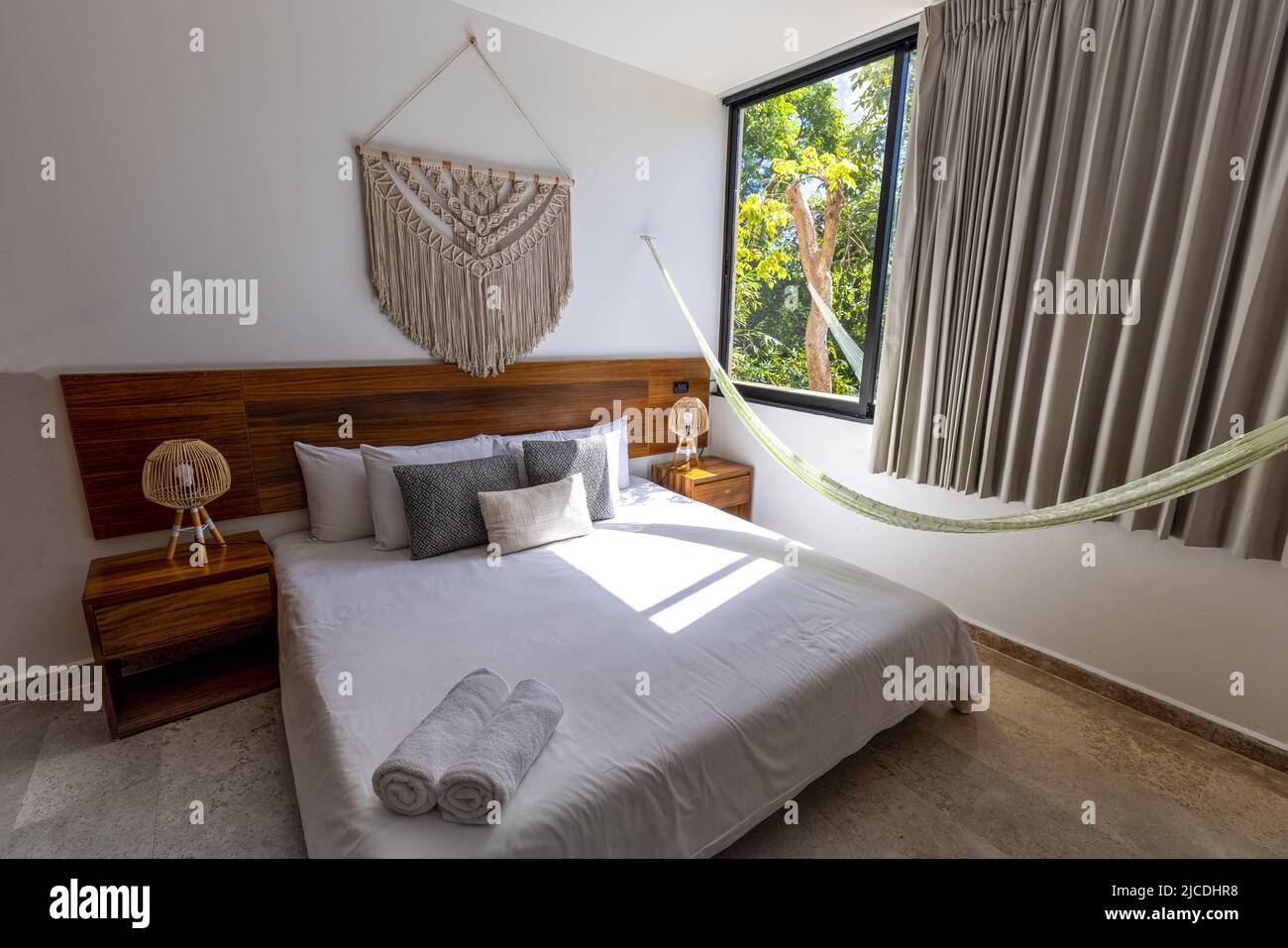 Mexico, Tulum upscale hotel room with jungle views and hammock Stock ...