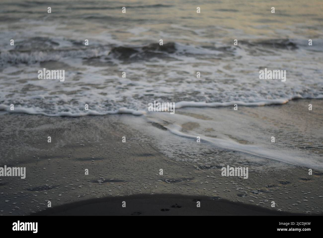 shallow waves are coming to the sea shore Stock Photo - Alamy