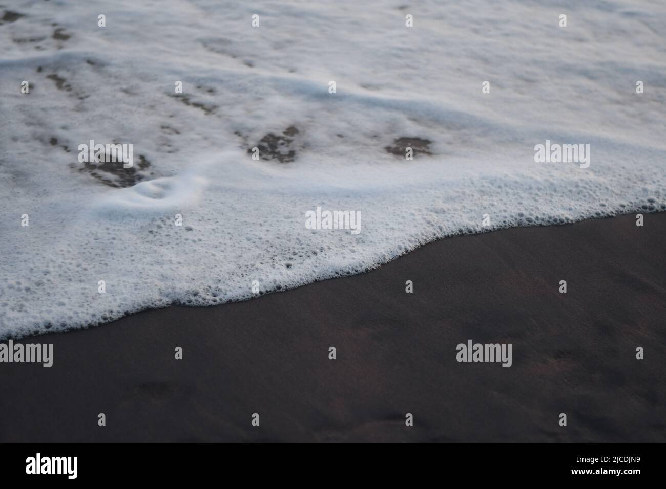 shallow waves are coming to the sea shore Stock Photo - Alamy