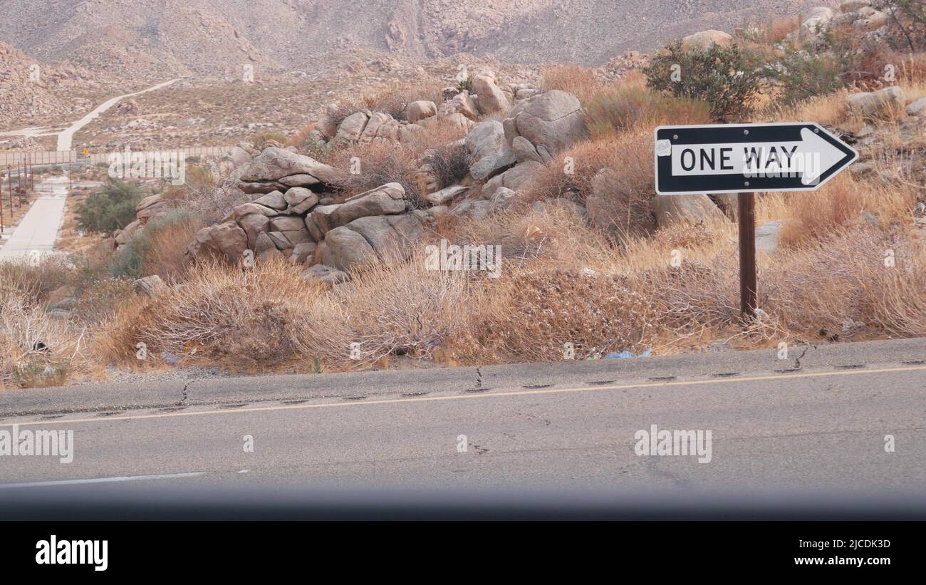 One way road transport sign with arrow on roadside or wayside, highway ...