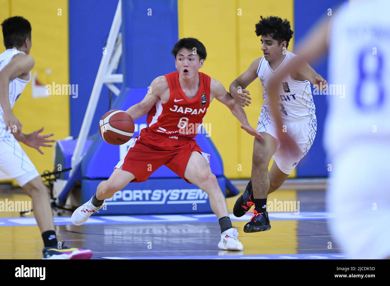 Doha, Qatar. 12th June, 2022. Suguru Ishiguchi (C) of Japan Basketball team in action during the ...