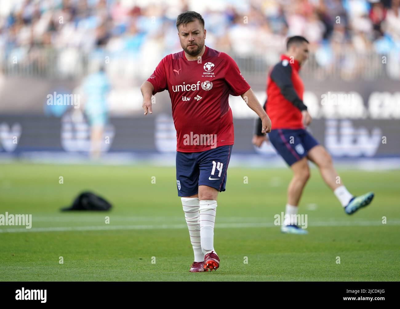 Alex Brooker warming up before the Soccer Aid for UNICEF match at The ...
