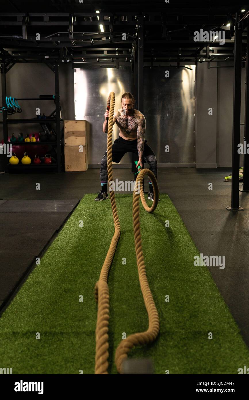Rope warehouse fitness green man grass training gym muscular young, for ...