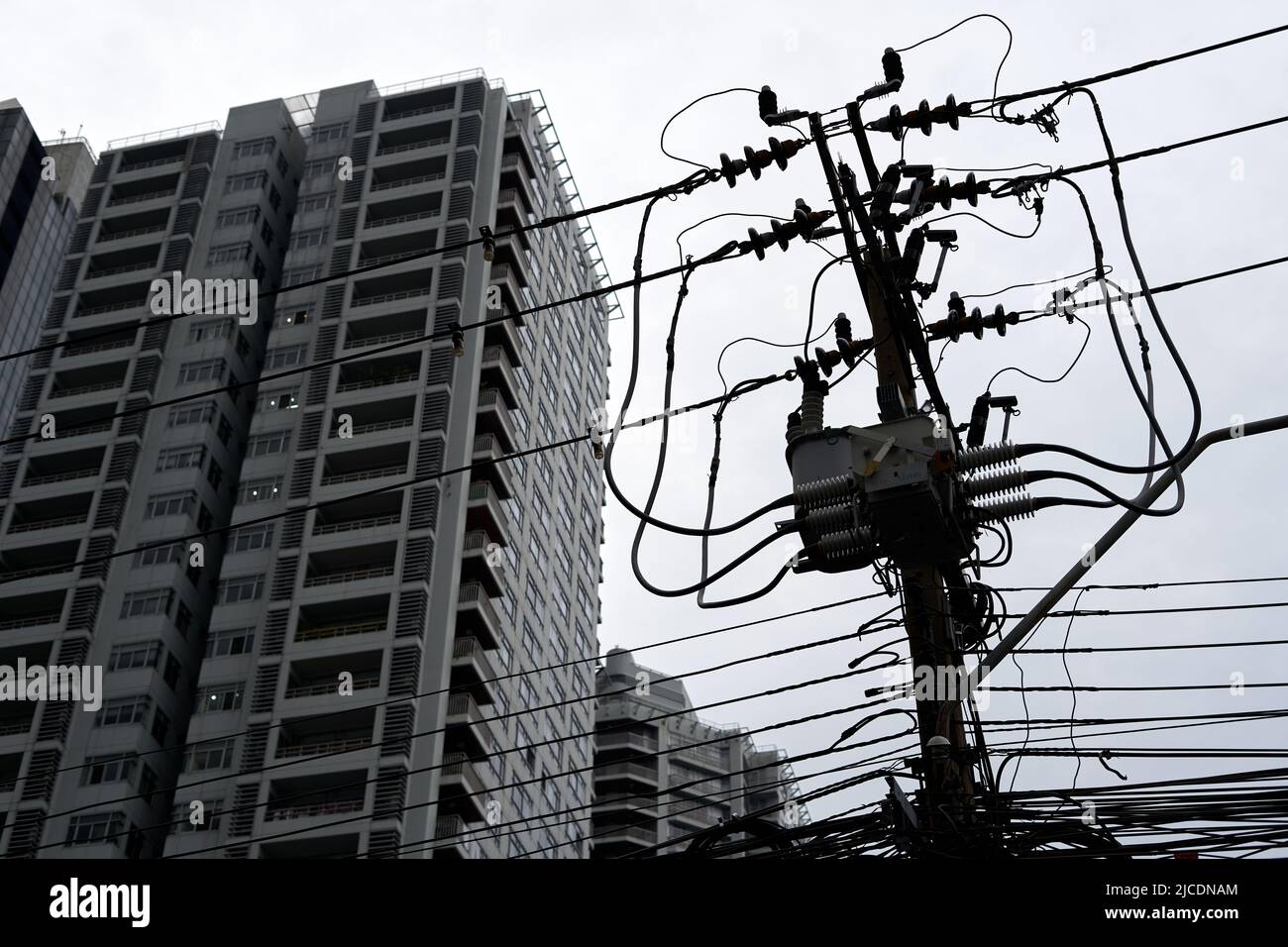 Electrical wiring of a city with skyscrapers Stock Photo - Alamy