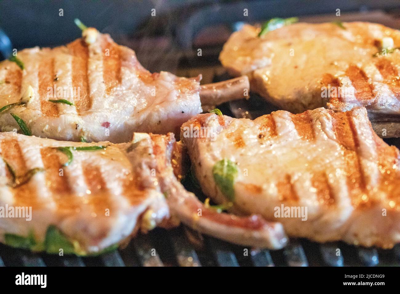 Iberico pork chop on the grill Stock Photo - Alamy