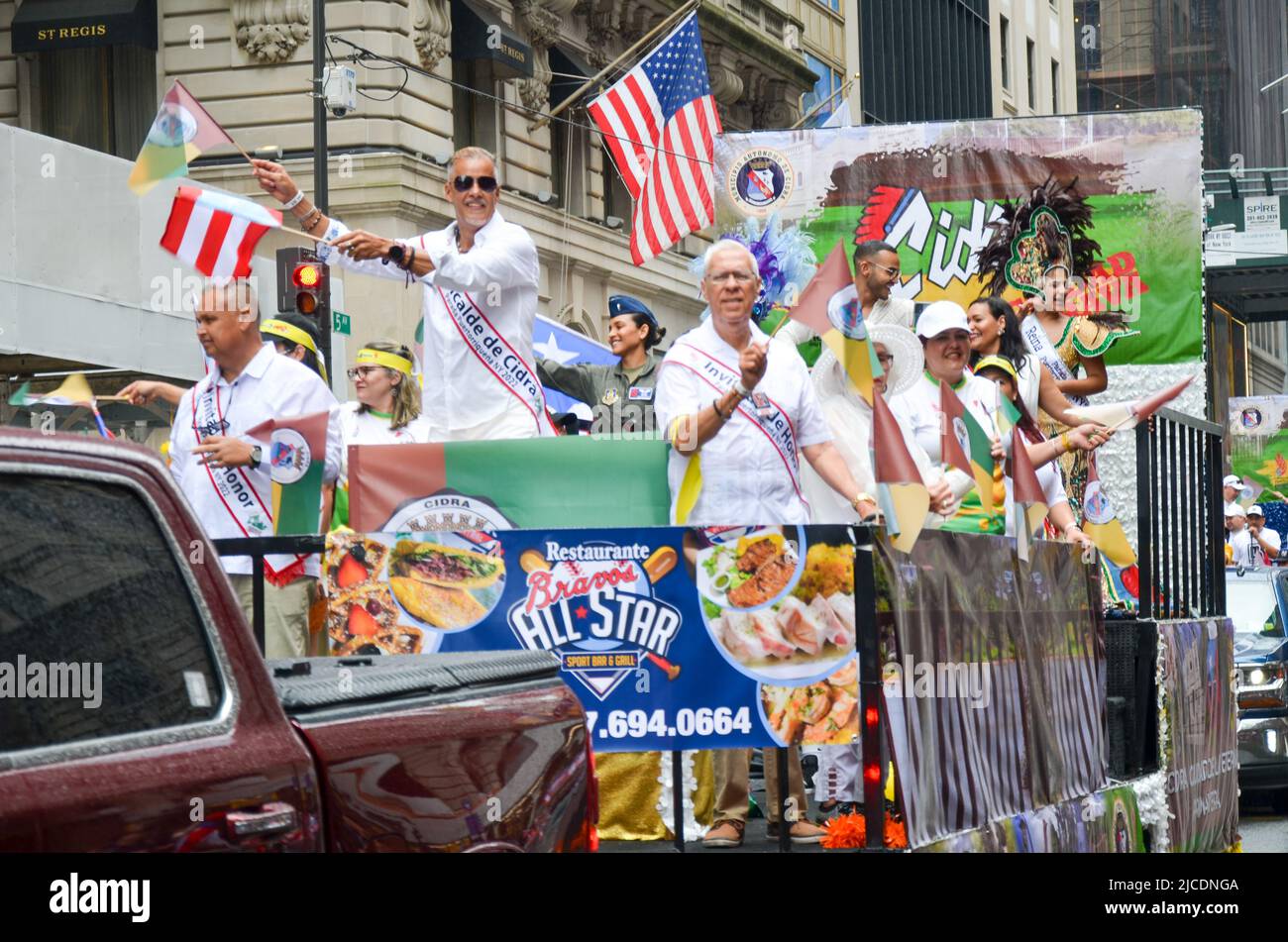 Participants are seen on parade float at Fifth Avenue in New York City ...
