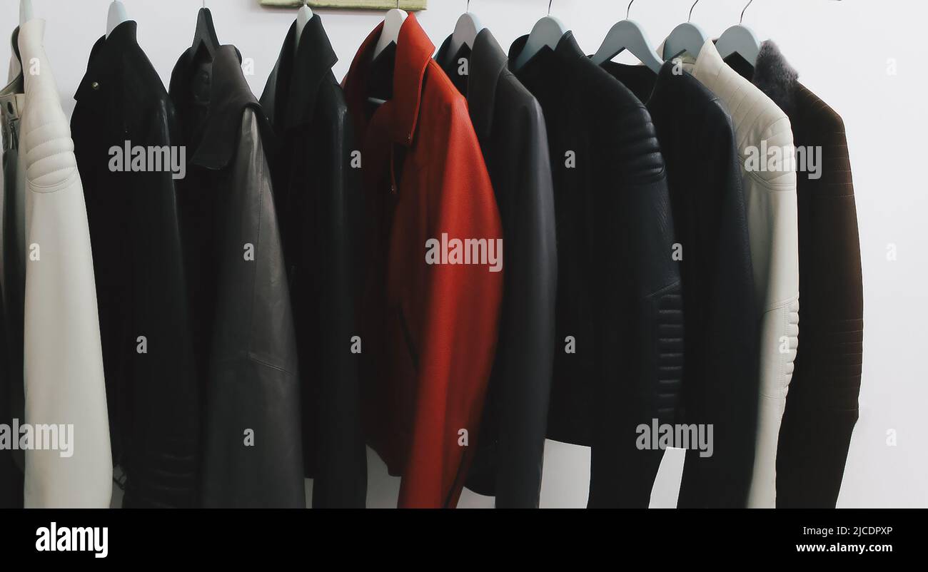 Collection of many new women's leather spring jackets on hangers in the ...