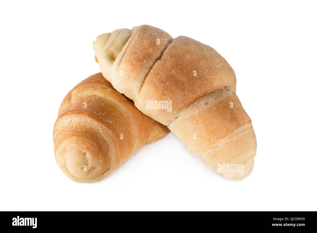 two croissants on top of each other isolated on white background Stock ...