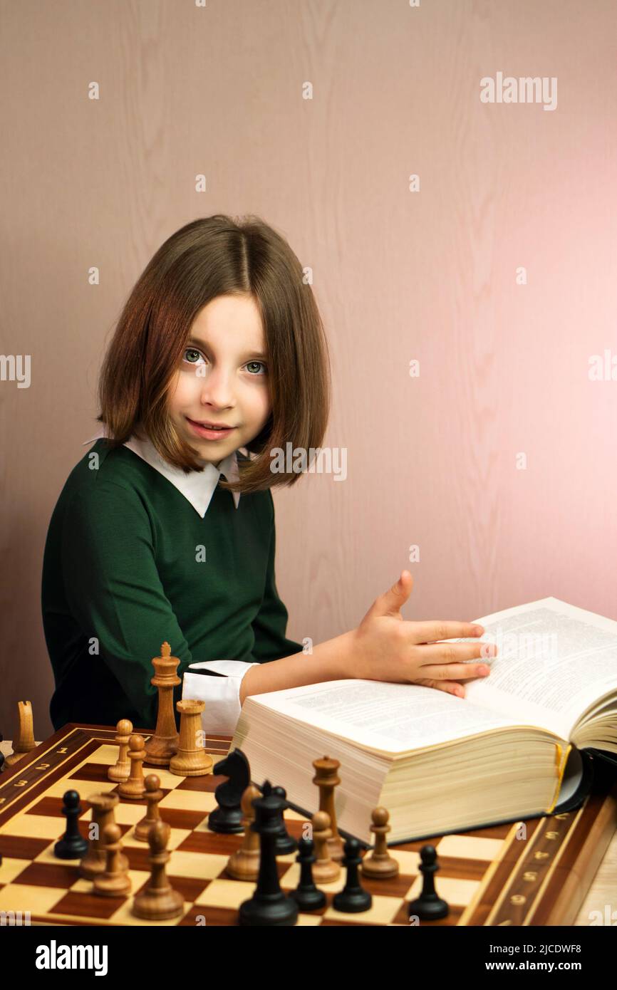 Smart and Purposeful Young Female Chess Player Reflects on Position of ...