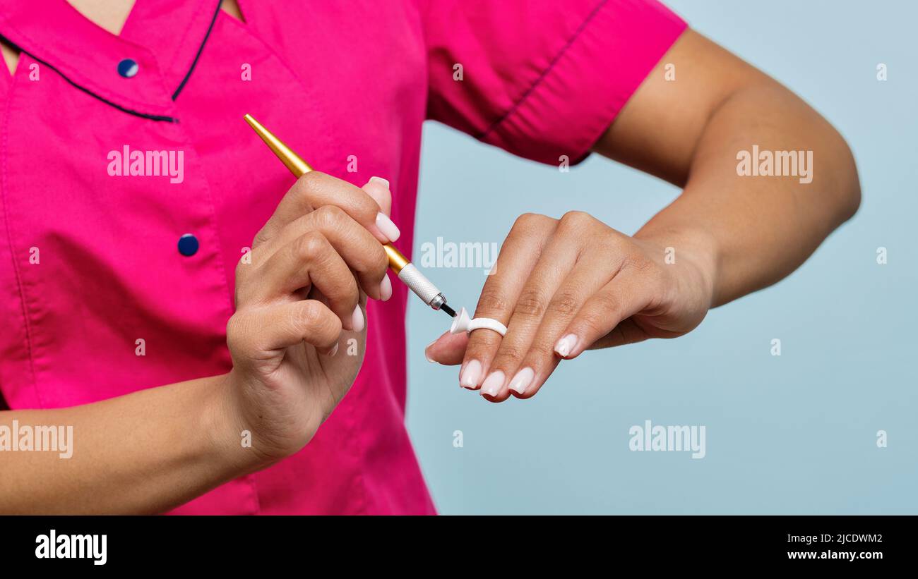 Dark Skinned Woman Master Beautician of eyebrow tattooing. Hand Eyebrow ...