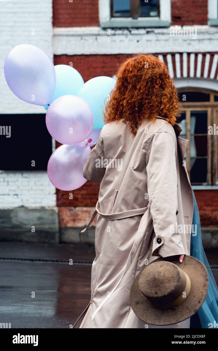 Back view woman in cloak hi-res stock photography and images - Alamy