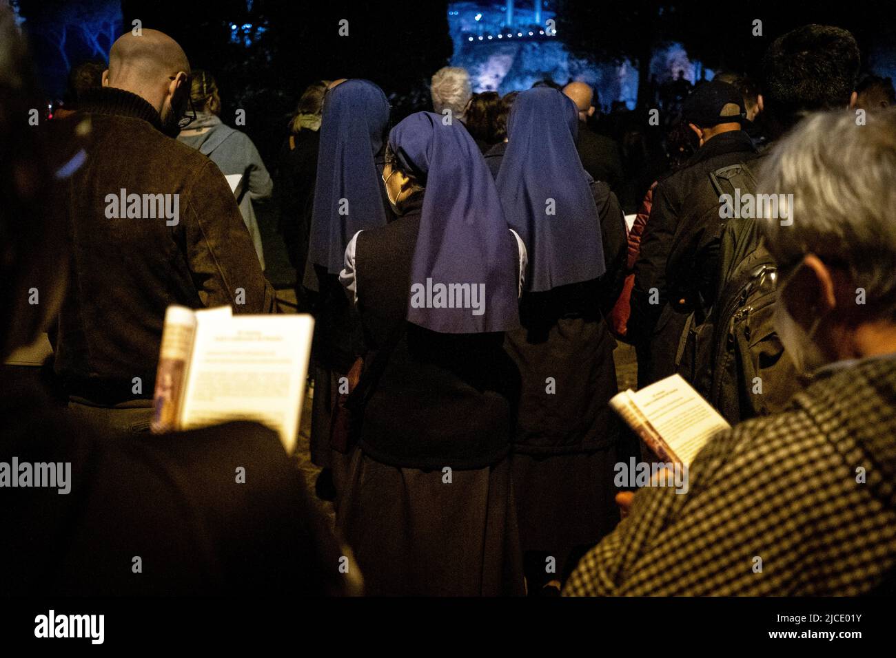 A torchlight procession at the foot of the hill at the Holy ground ...