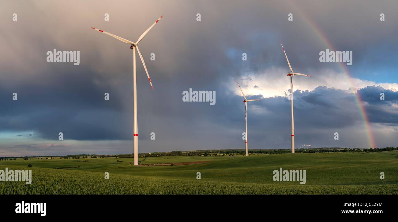 Rainbow over wind turbines hi-res stock photography and images - Alamy