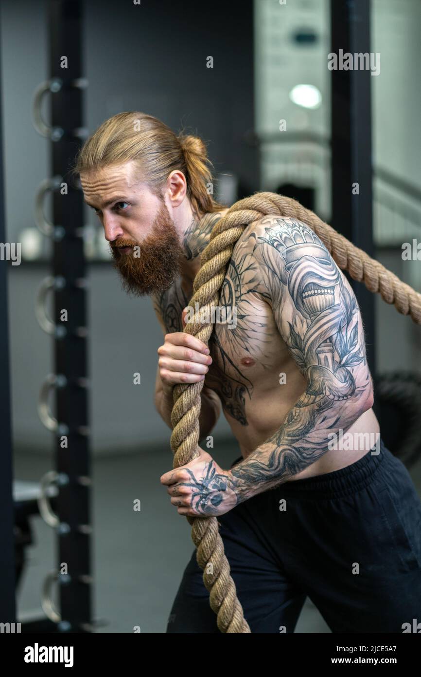 Rope invisible man tug pull was casual force person competition ...