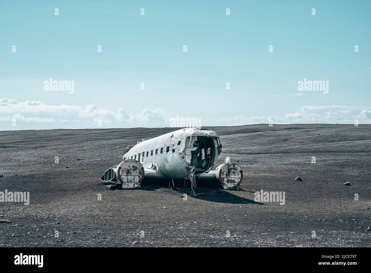 Famous broken airplane wreck at black sand beach in Solheimasandur ...